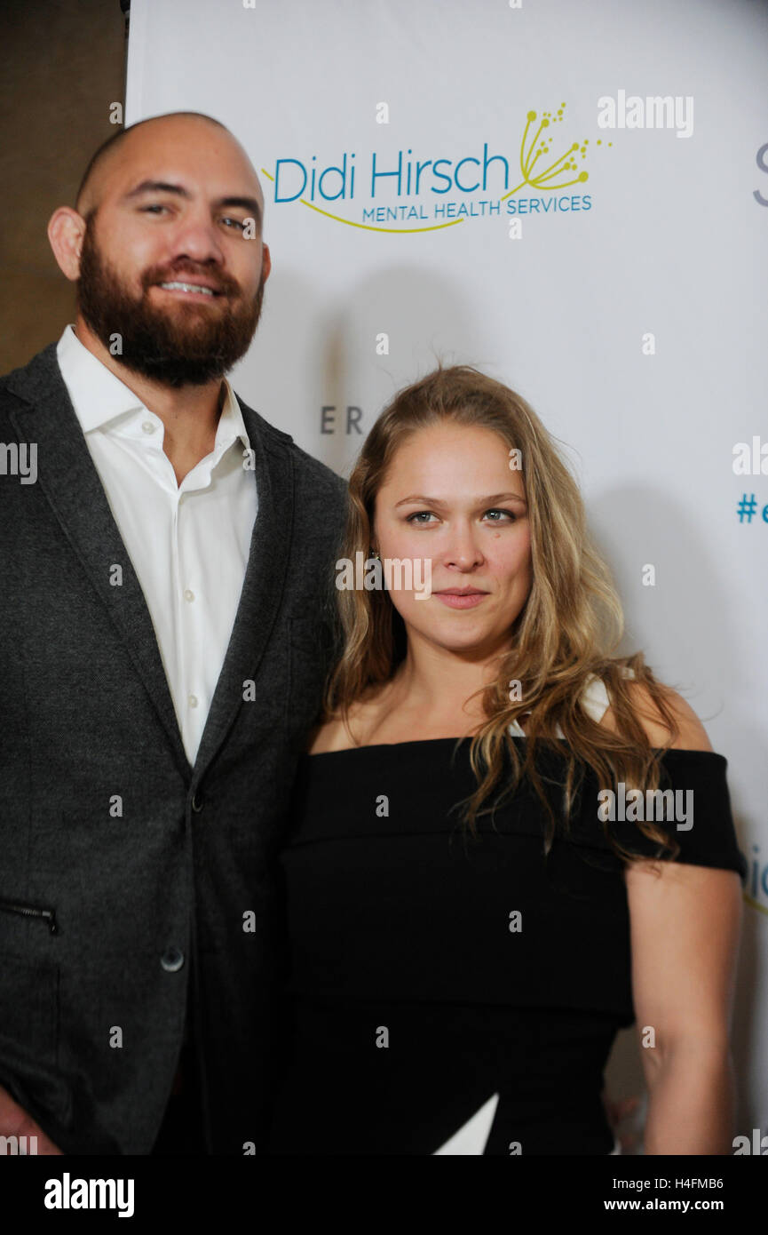 Ronda Rousey and Travis Browne arrives at the 20th Anniversary Erasing ...