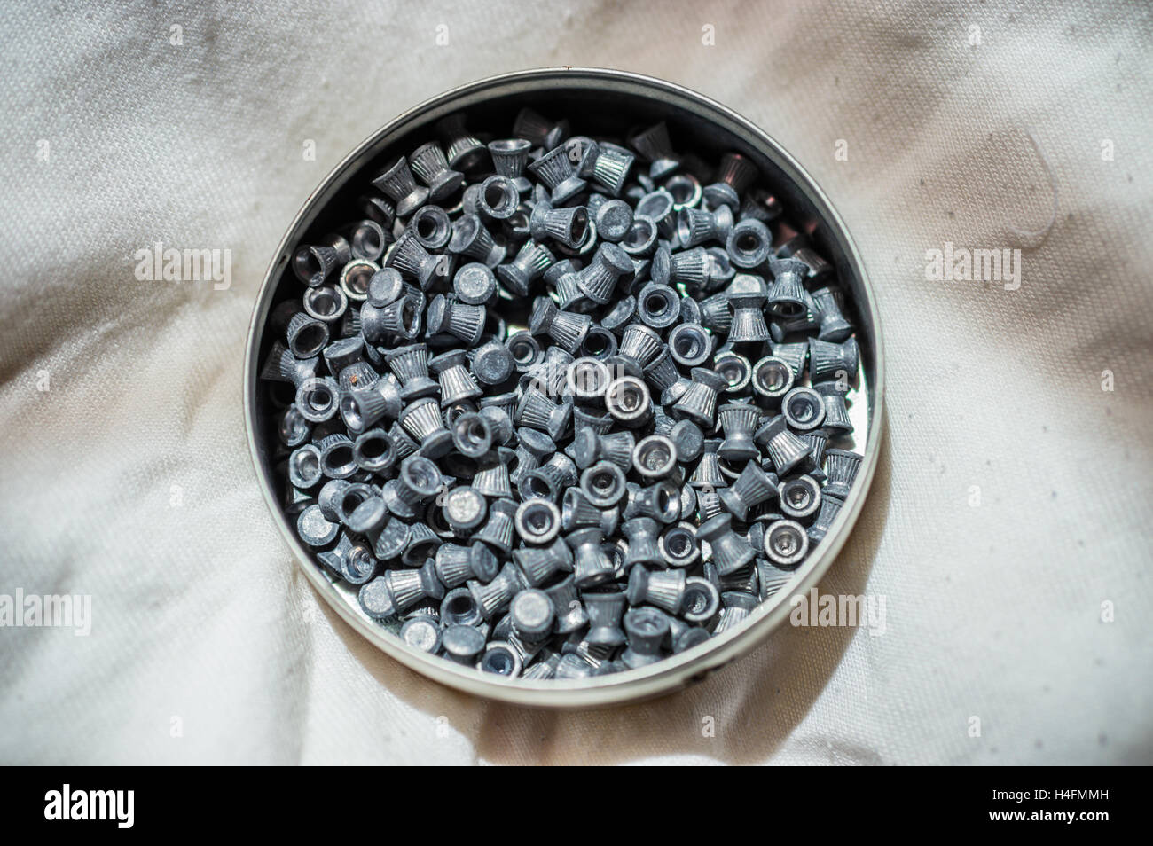 bullets for air rifle in aluminum can Stock Photo - Alamy