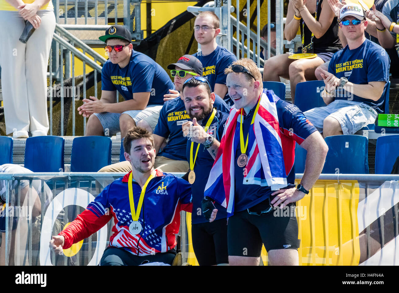 Paul Vice of the United Kingdom (gold) gives a thumbs up to the crowd ...