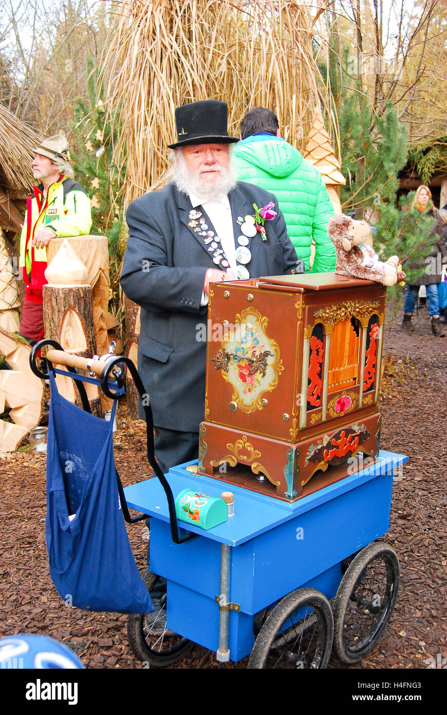 Man playing barrel organ hi-res stock photography and images - Alamy