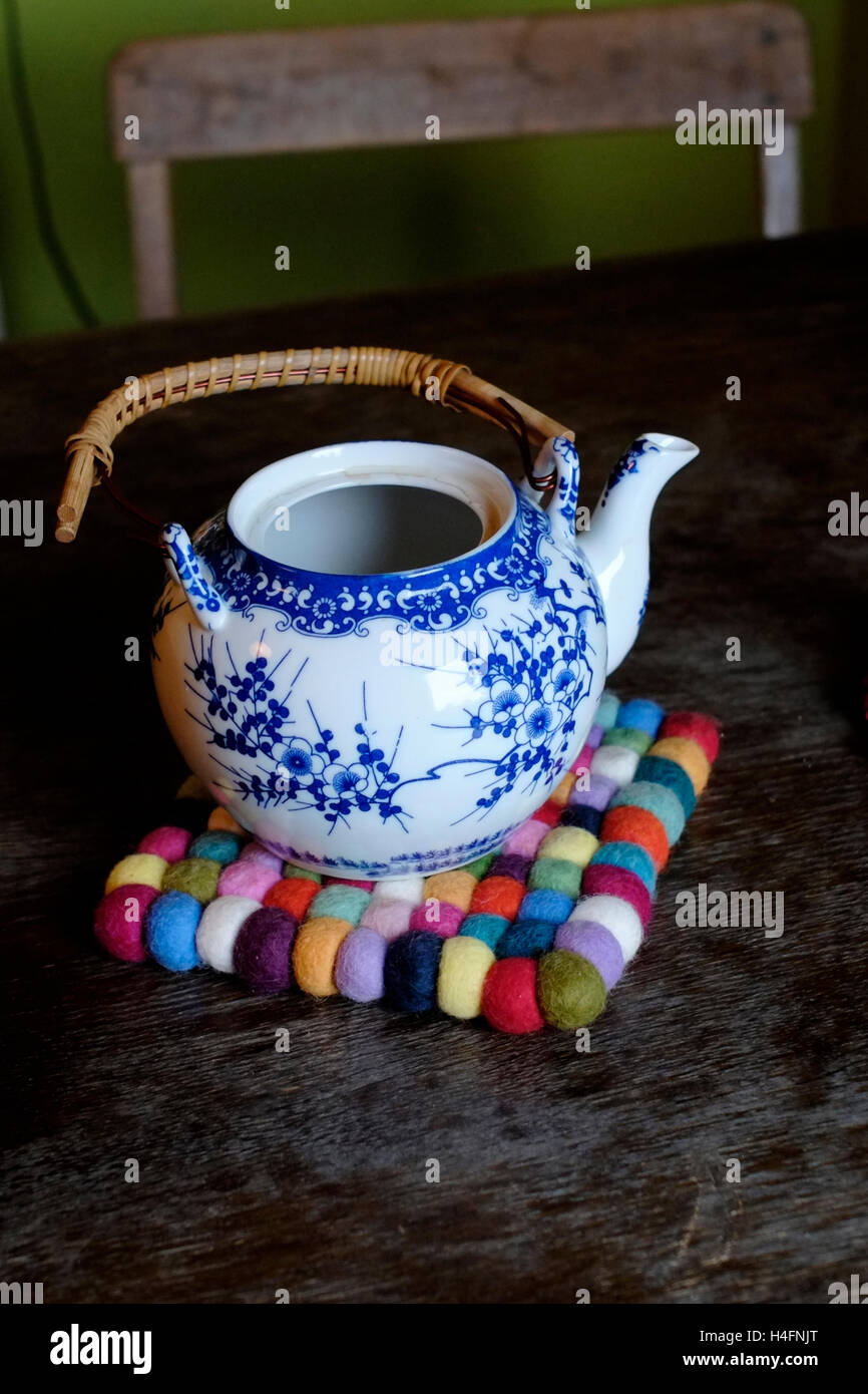 Teapot on a table Stock Photo - Alamy