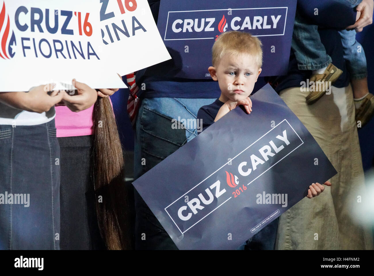 A young man on stage with the Rally With Ted Cruz in Jeffersonville ...