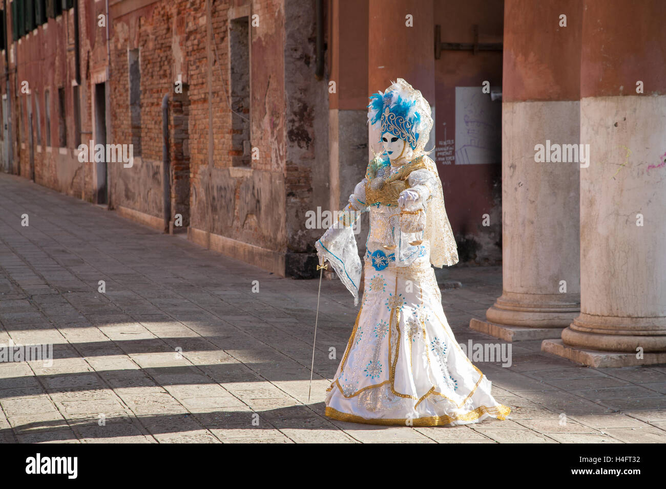 The mask with stick, Venice, Italy Stock Photo - Alamy