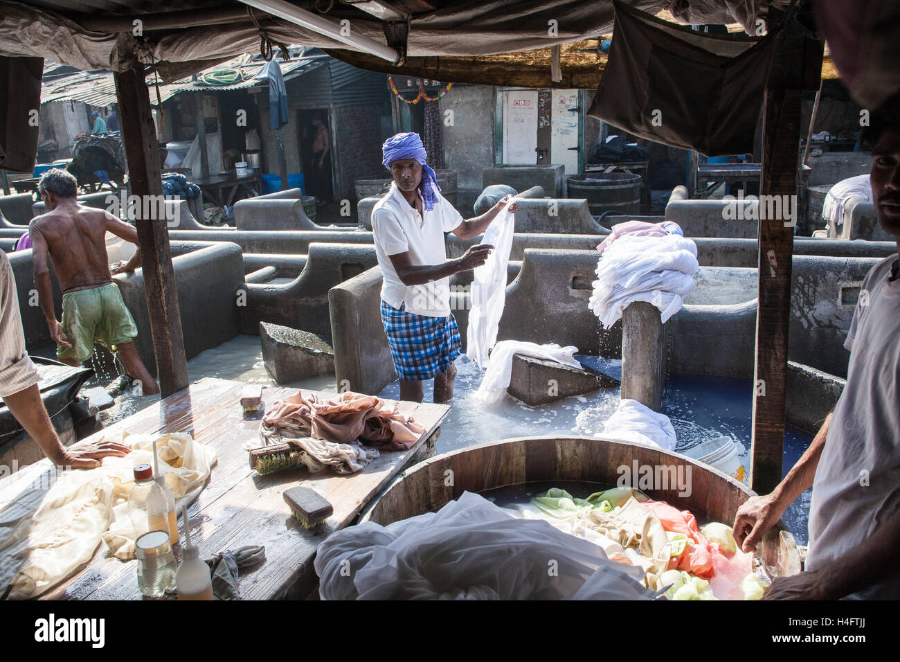 Washing wash day hand washing laundry and hanging clothes at Dhobi Ghat ...