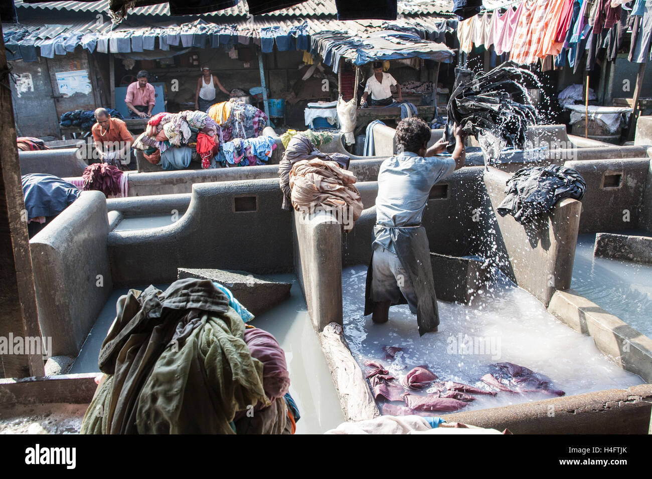 Washing wash day hand washing laundry and hanging clothes at Dhobi Ghat ...