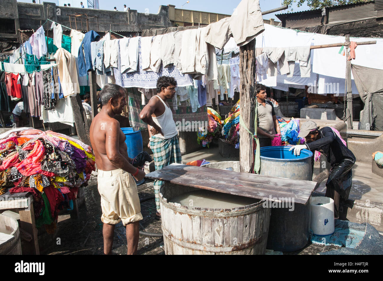 Washing wash day hand washing laundry and hanging clothes at Dhobi Ghat ...