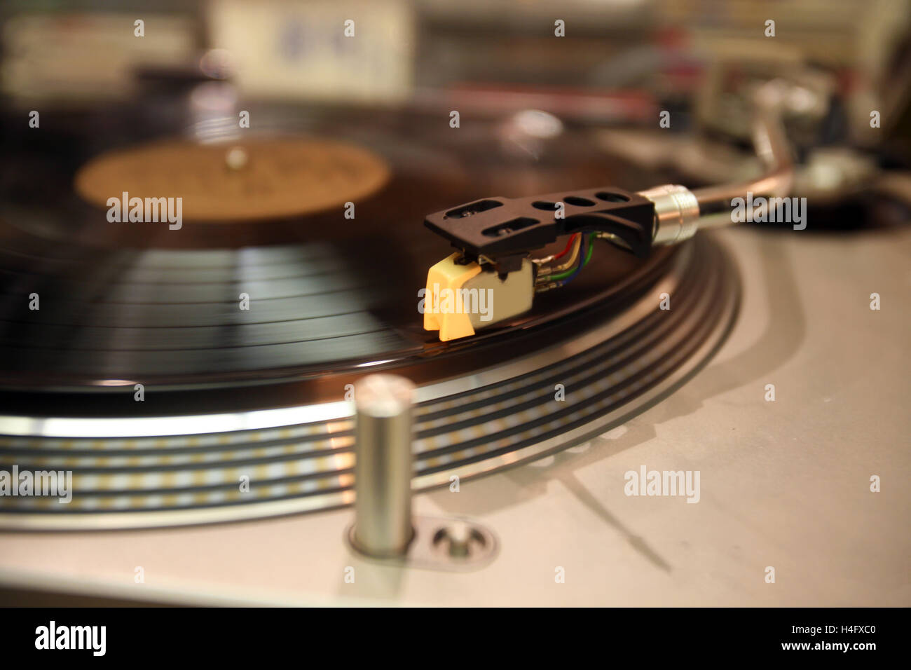 Turntable in action with focus on the cartridge Stock Photo - Alamy
