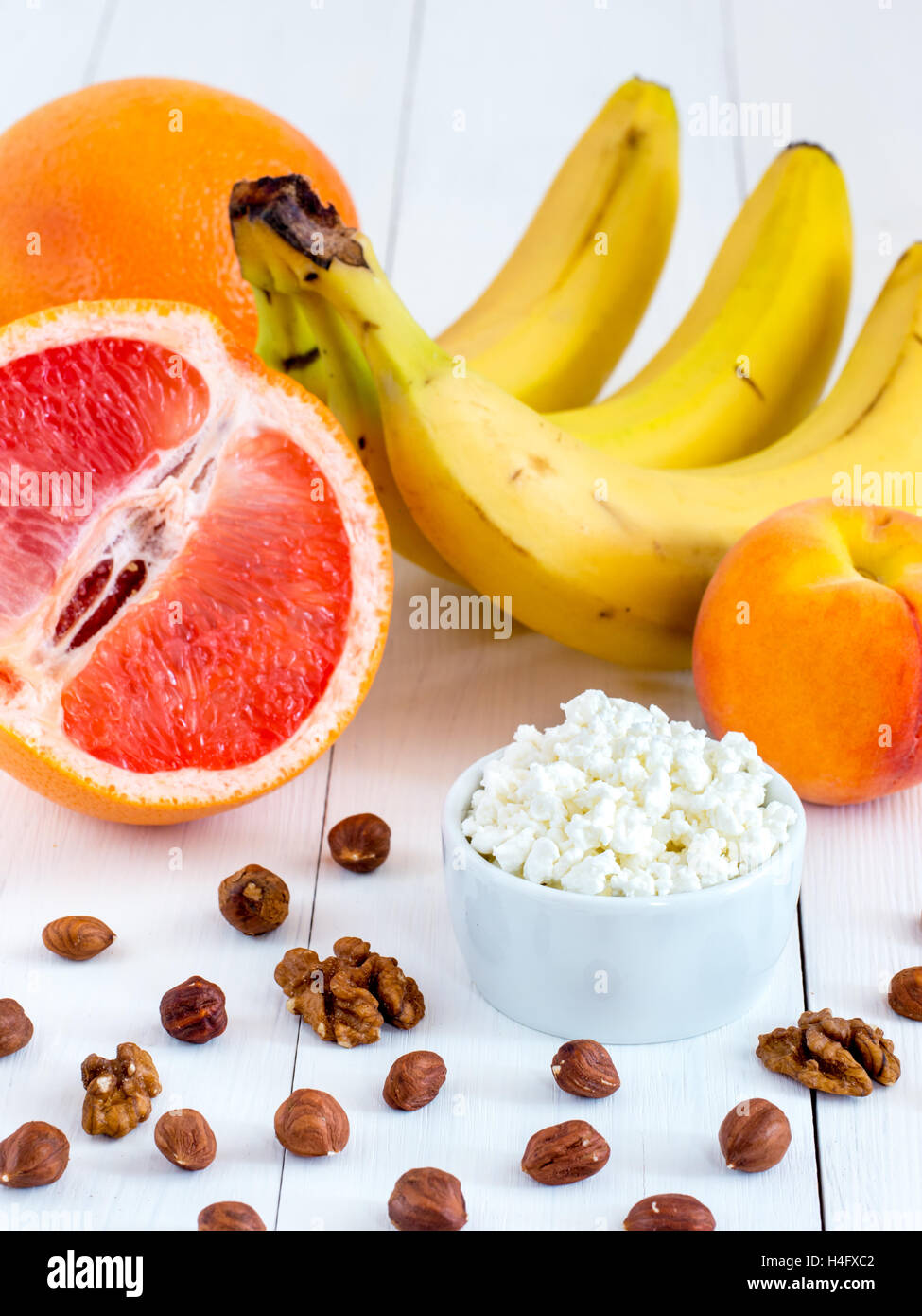 dieting cottage cheese with fresh fruits and nuts Stock Photo - Alamy