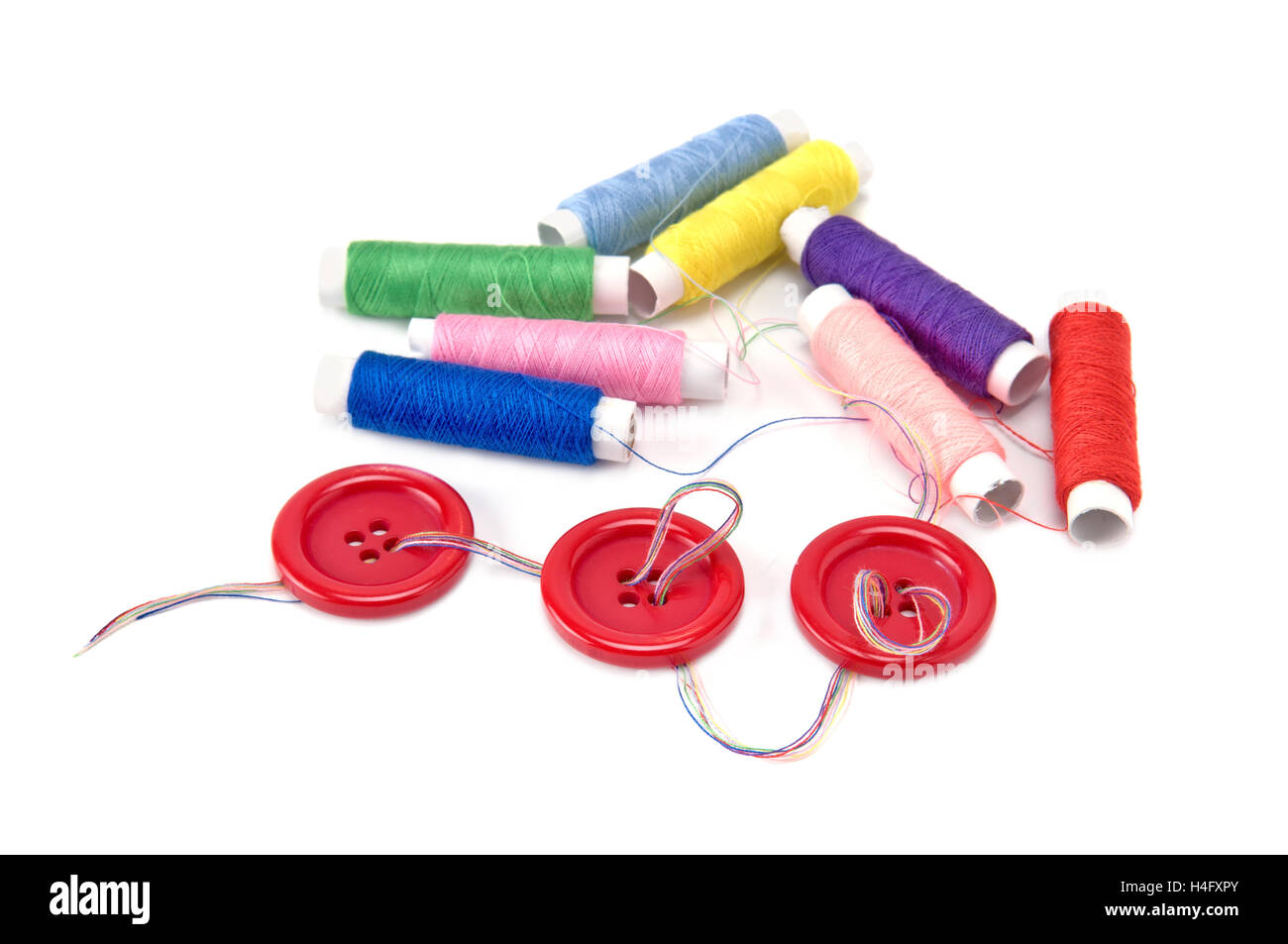 Thread spools on sewing Cut Out Stock Images & Pictures - Alamy