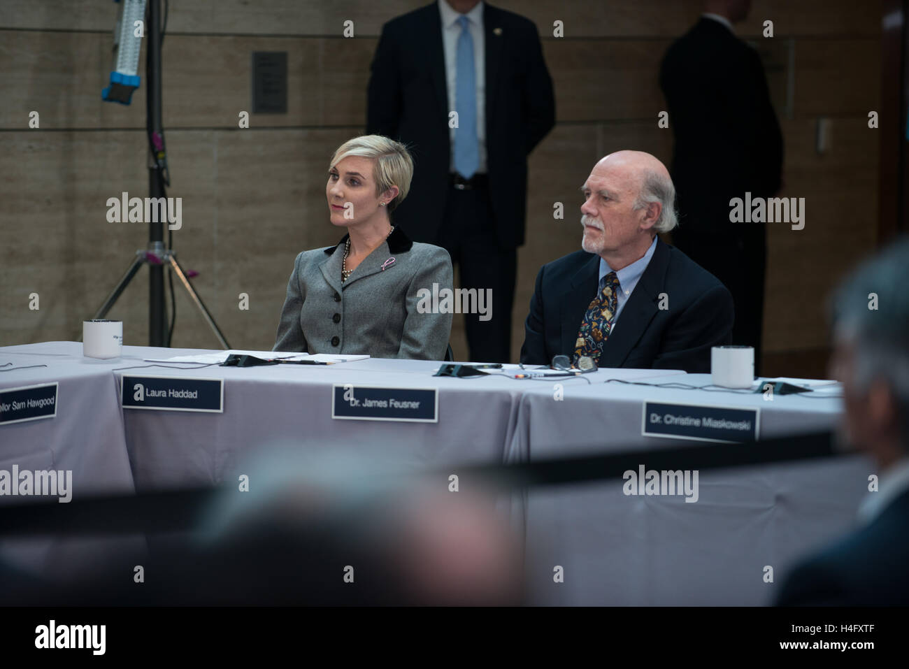 Laura Haddad and Dr. James Feusner MD look on while Joe Biden speaks at ...
