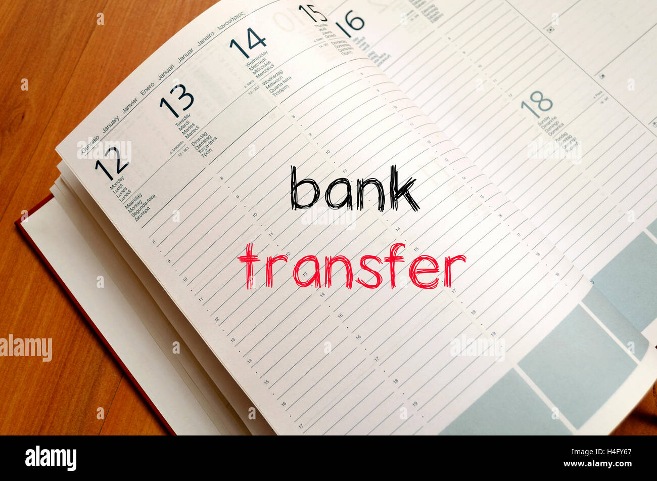 Bank transfer text concept write on notebook Stock Photo - Alamy