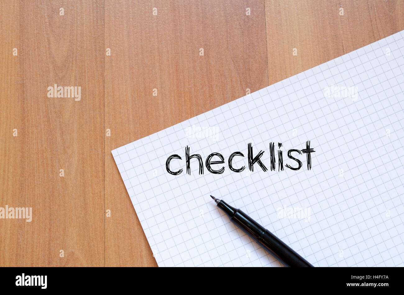 Checklist text concept write on notebook Stock Photo - Alamy
