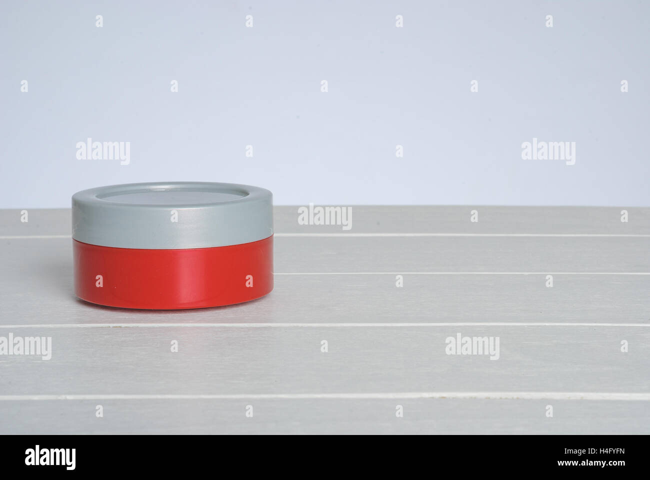tib of face cream with red cover Stock Photo - Alamy