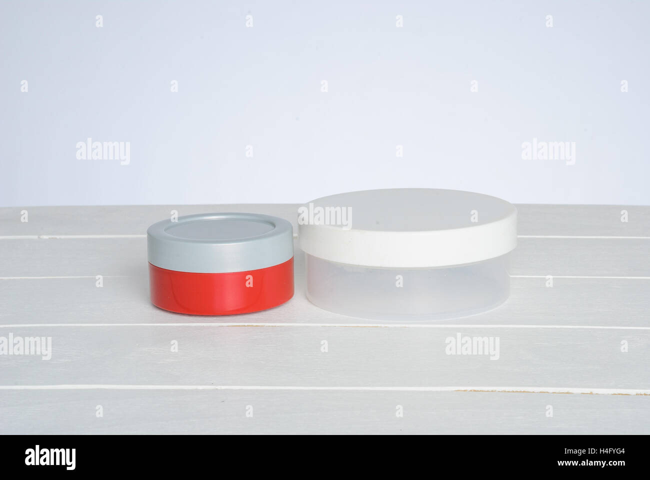 tib of face cream with red cover Stock Photo - Alamy