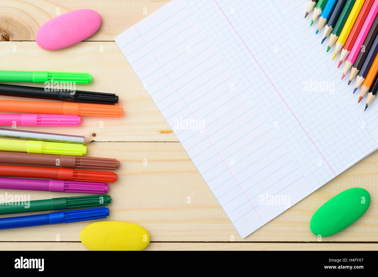 Colored pencils and paper Stock Photo - Alamy