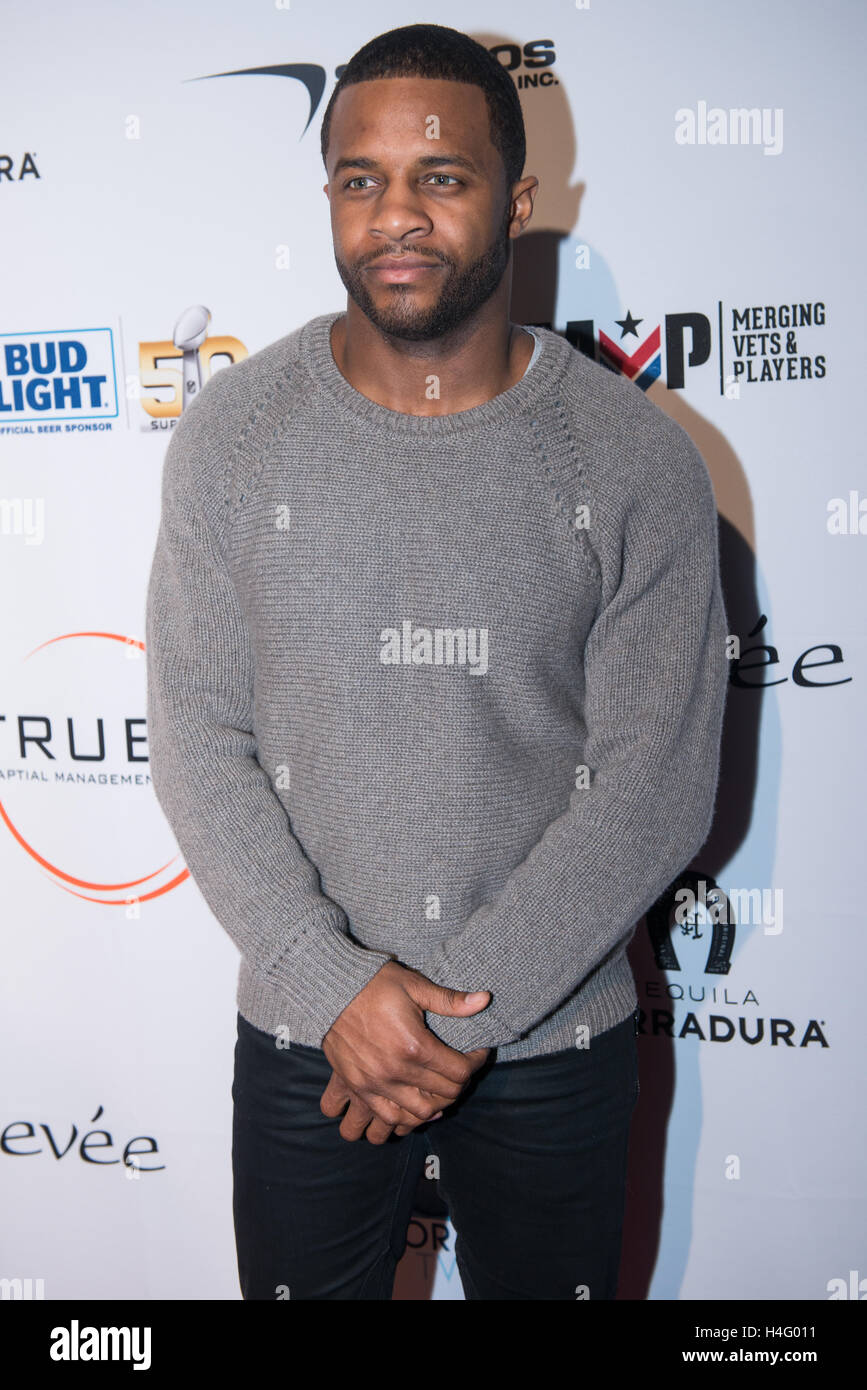 Randall Cobb poses for a photo at the Glazer Palooza + Suits & Sneakers ...