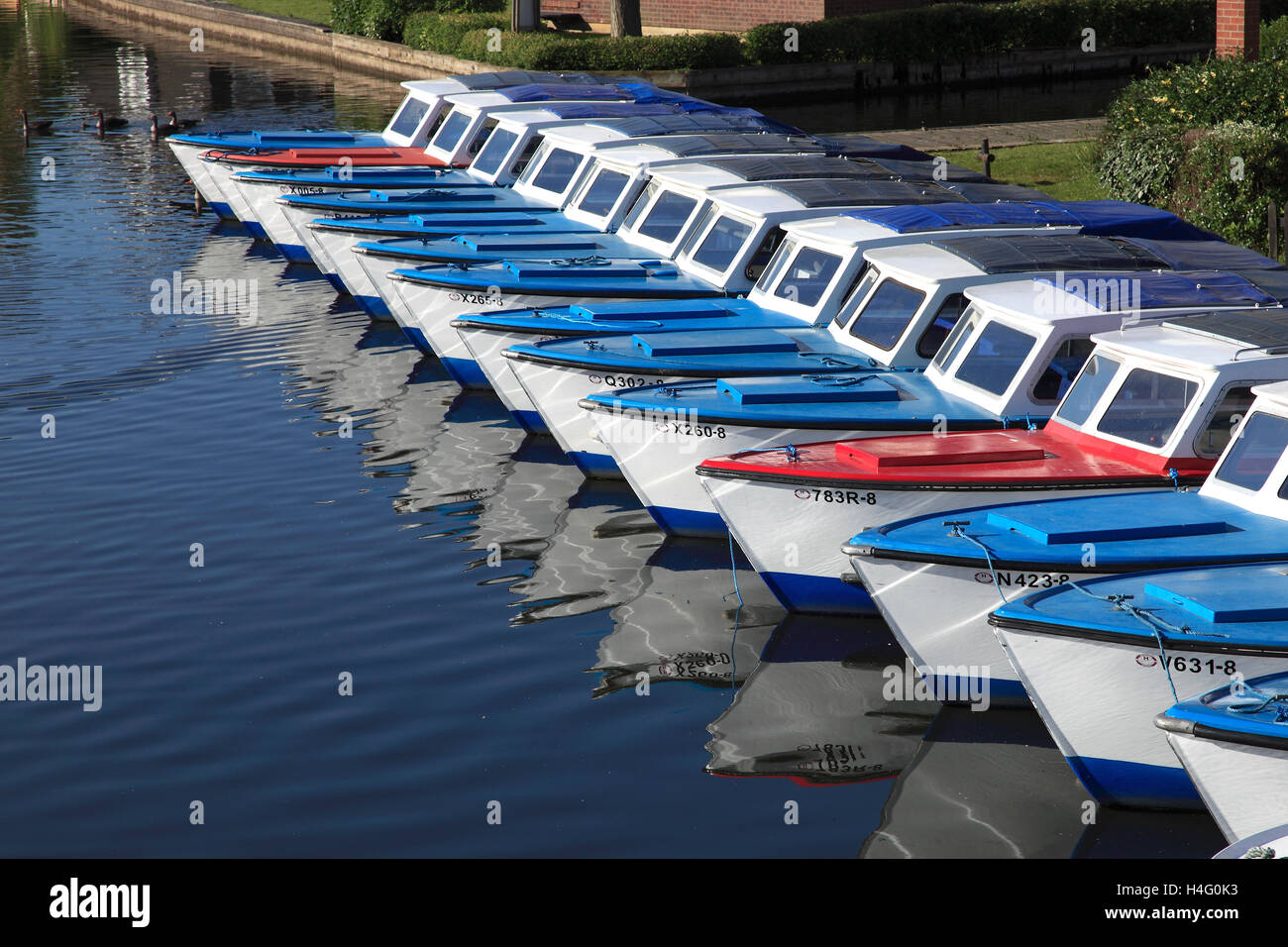 Boats on the river Bure, Wroxham town, Norfolk Broads National Park ...