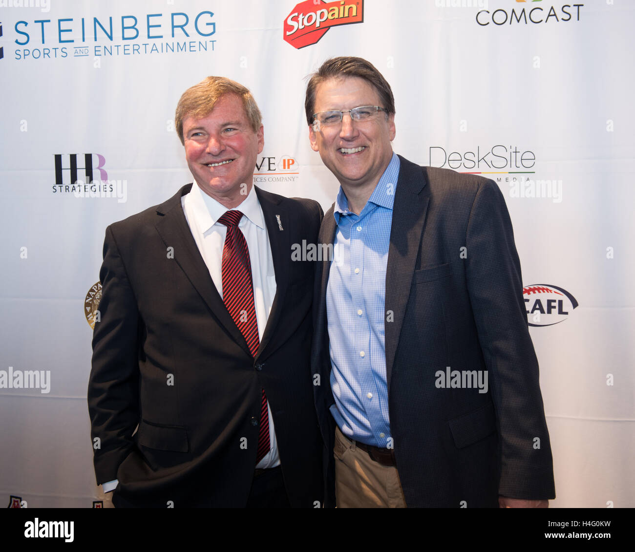 Leigh Steinberg and Governor Pat McCrory pose on the red carpet at the ...