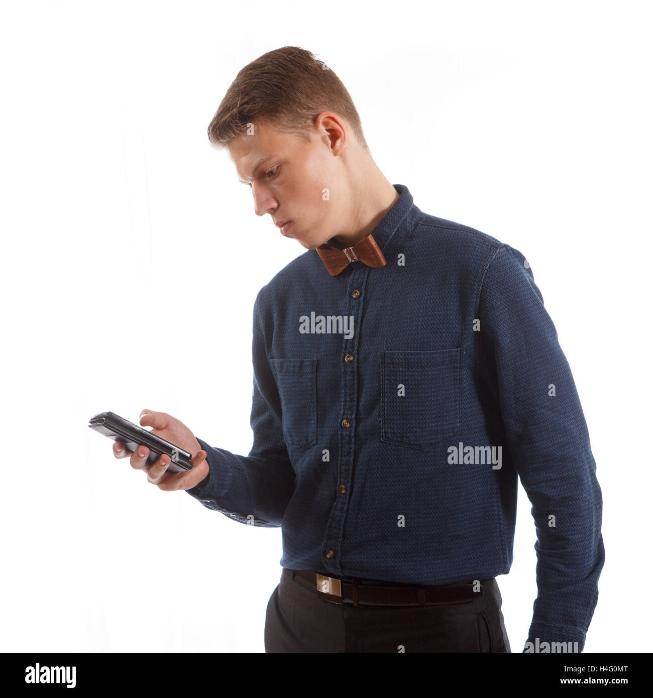 Man looking at phone Stock Photo - Alamy