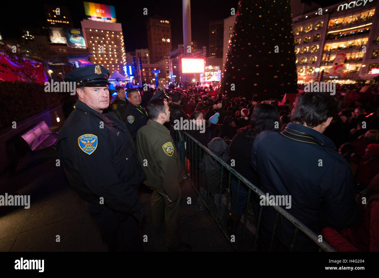 Police monitor the crowd at Union Square in downtown San Francisco ...