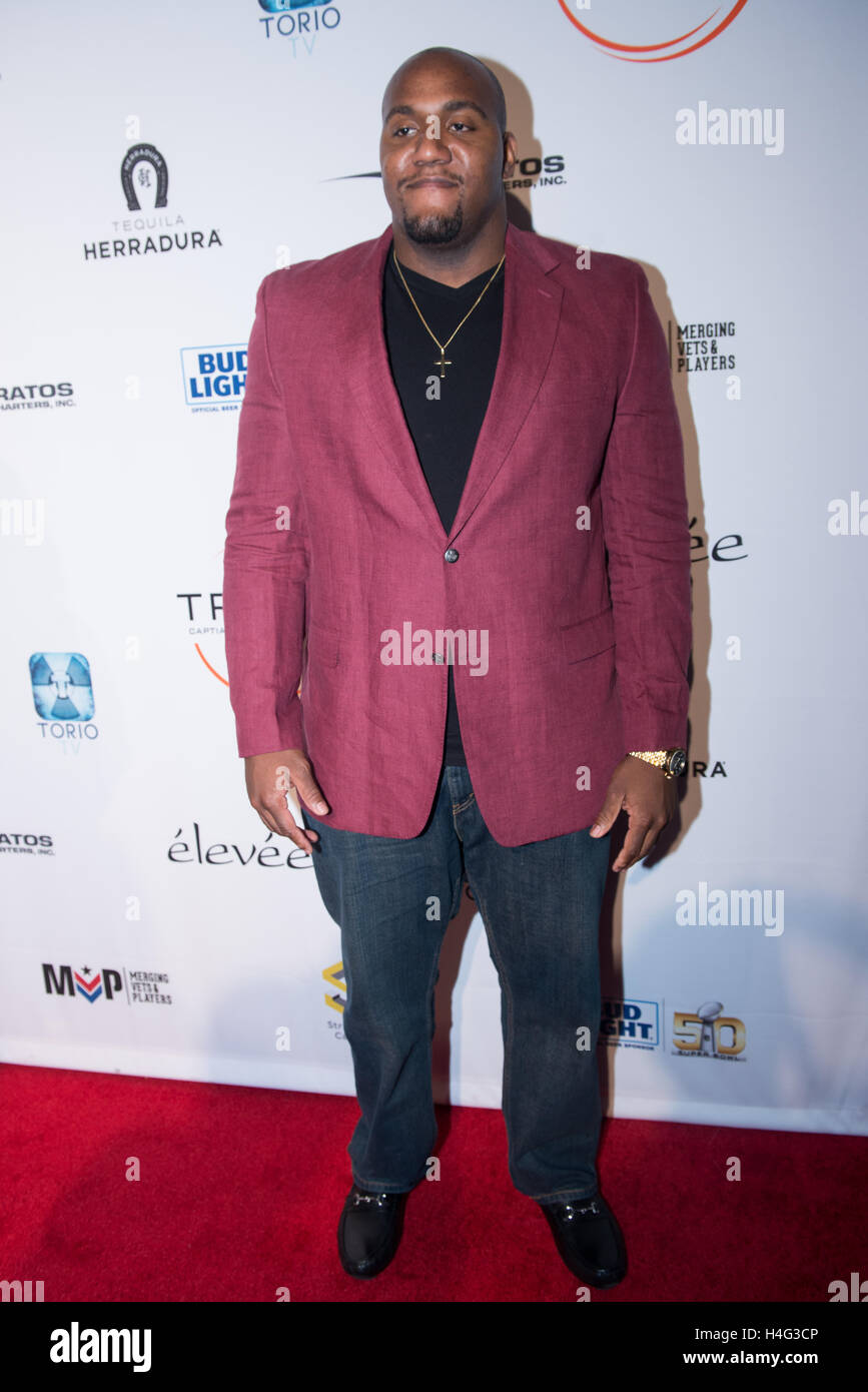 Brandon Thomas poses for a photo at the Glazer Palooza + Suits ...