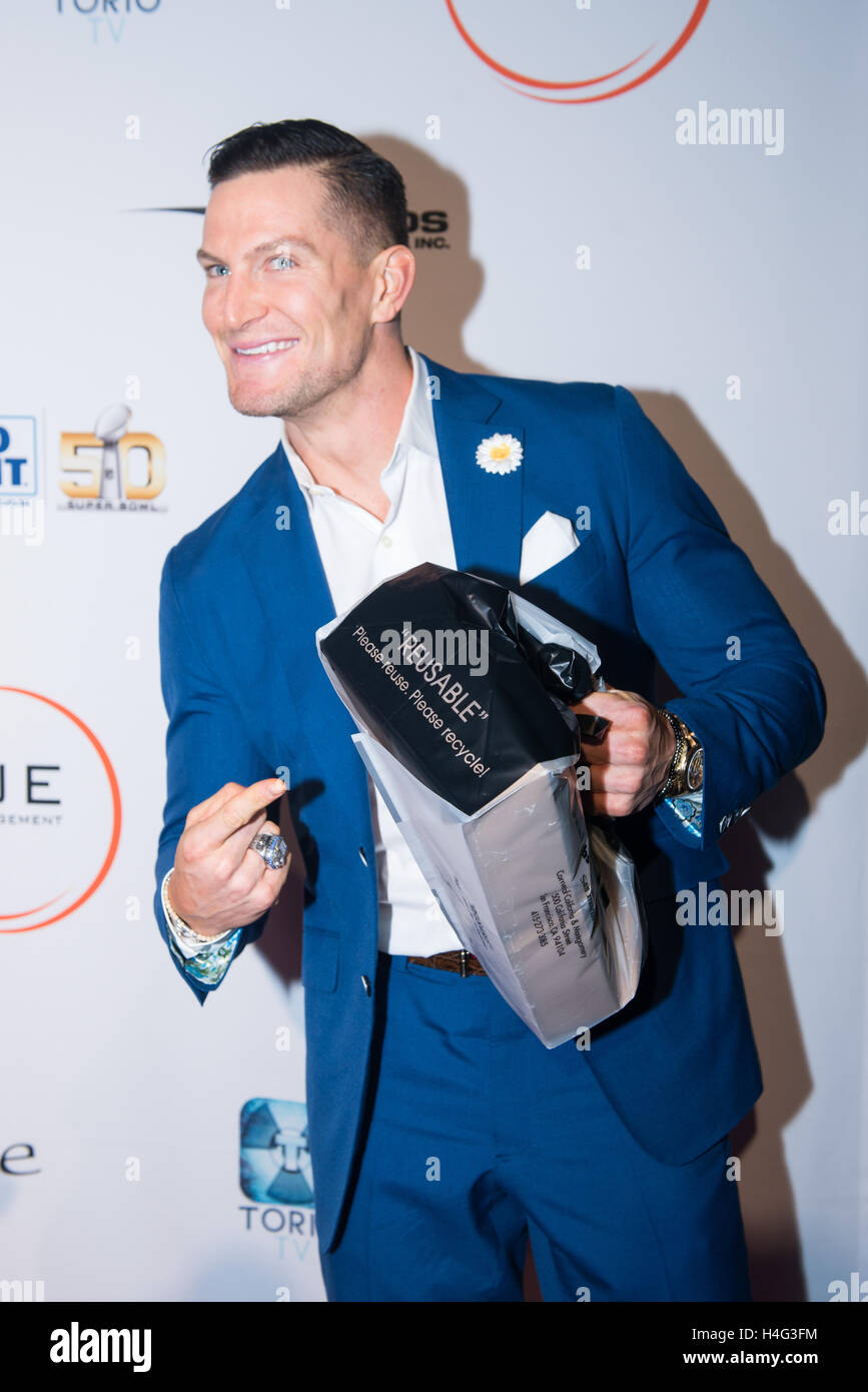 Steve Weatherford poses for a photo with his leftover salmon at the ...