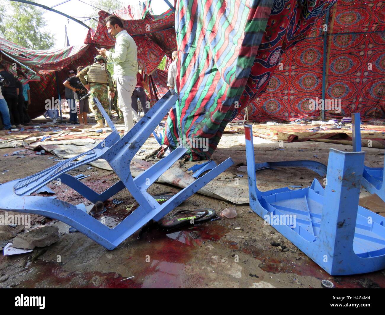 Baghdad, Iraq. 15th Oct, 2016. Blood stains are seen at the site of a ...