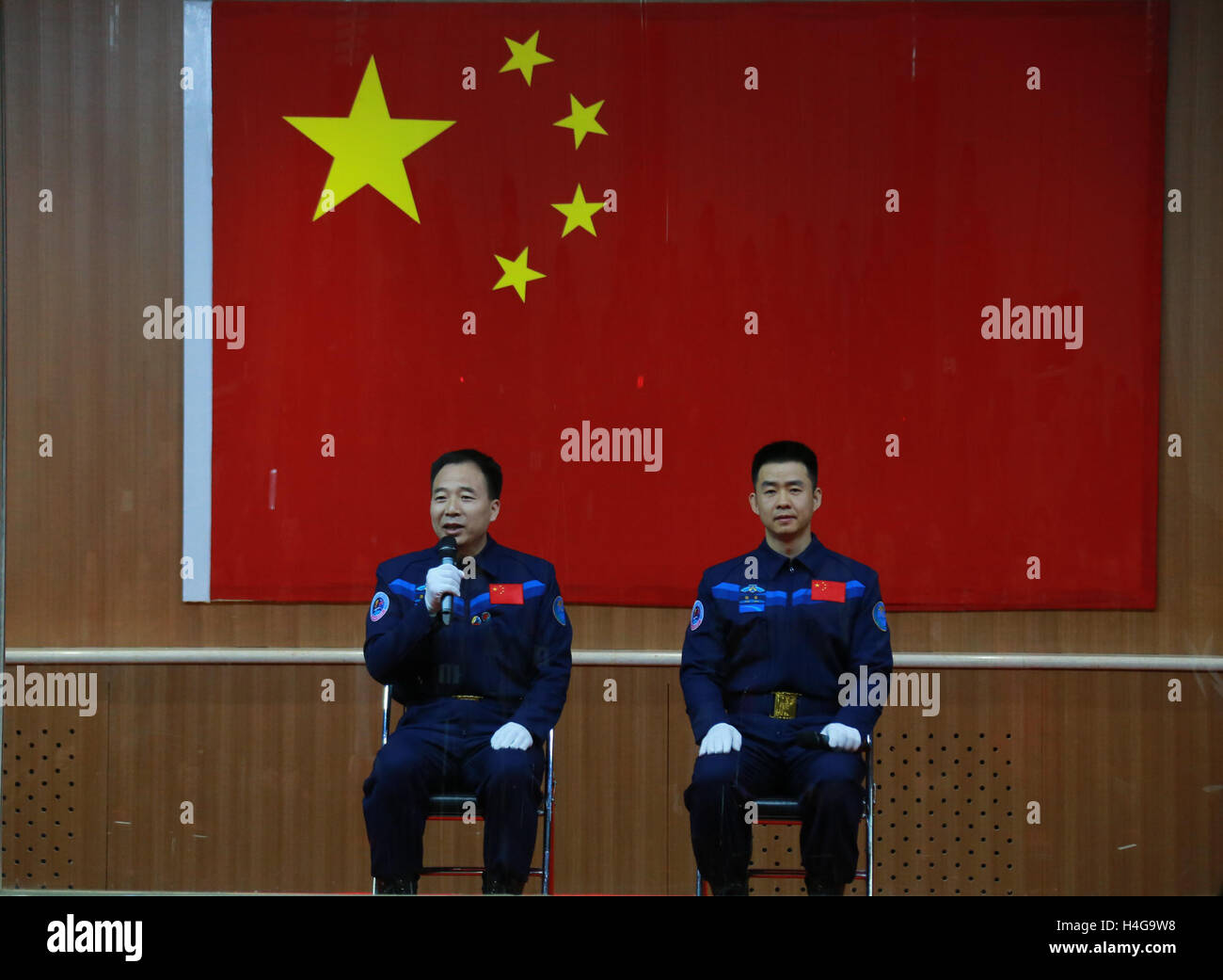 Jiuquan. 17th Oct, 2016. Chinese astronauts Jing Haipeng (L) and Chen ...