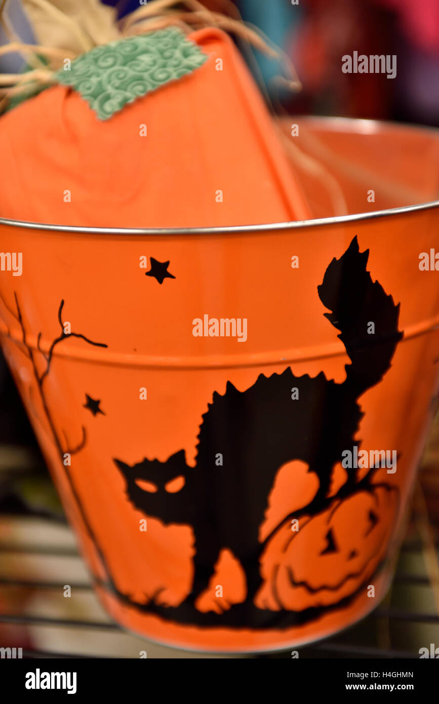 Halloween trick or treat collecting bucket Stock Photo - Alamy