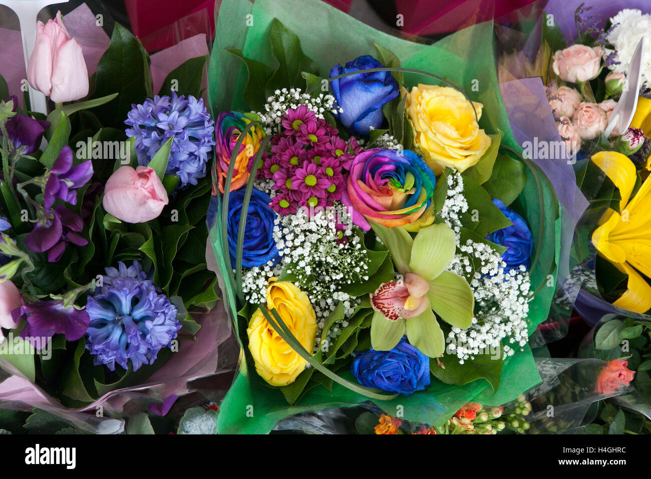 Bouquet of yellow fresia, hyacinth and colorful rose flower Stock Photo ...