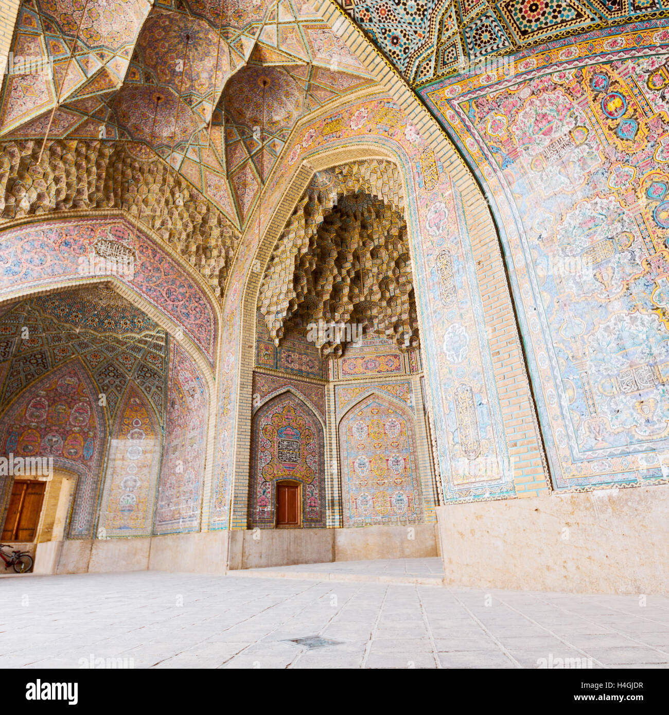 in iran the old mosque and traditional wall tile incision near minaret ...