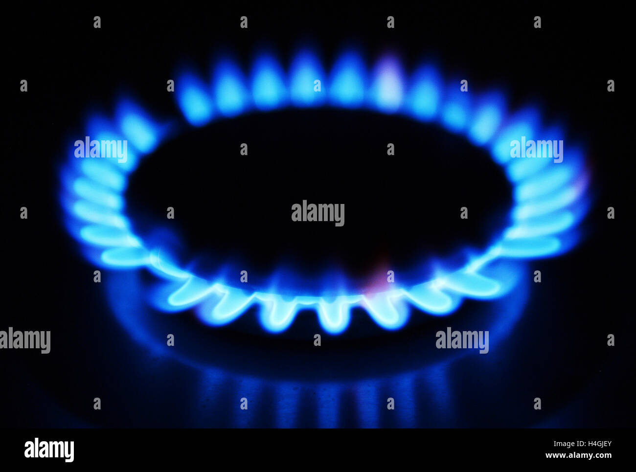 A gas burner on a hob cooking appliance Stock Photo - Alamy