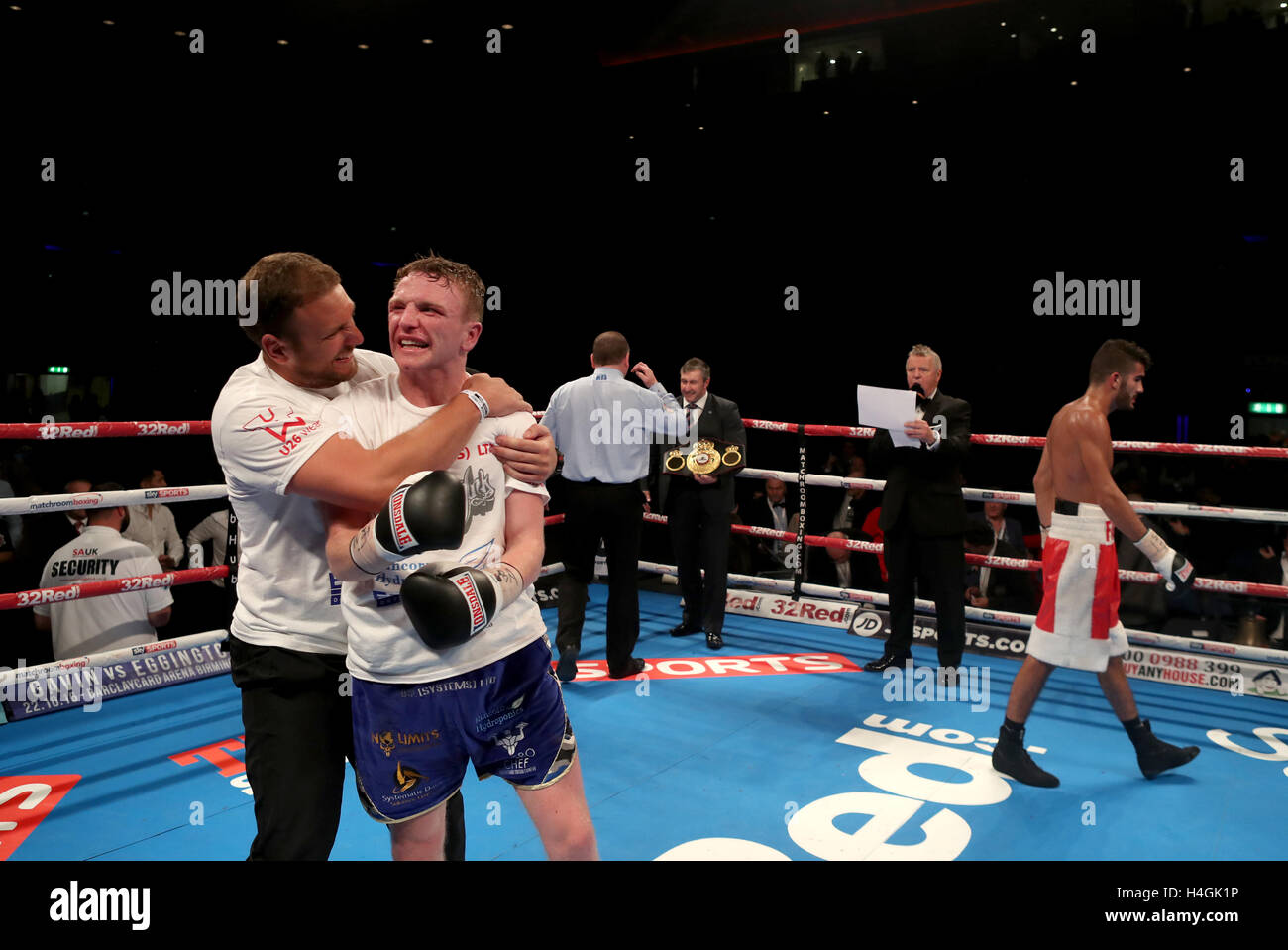 Tom Farrell celebrates victory over Farid Hakimi at the Echo Arena ...