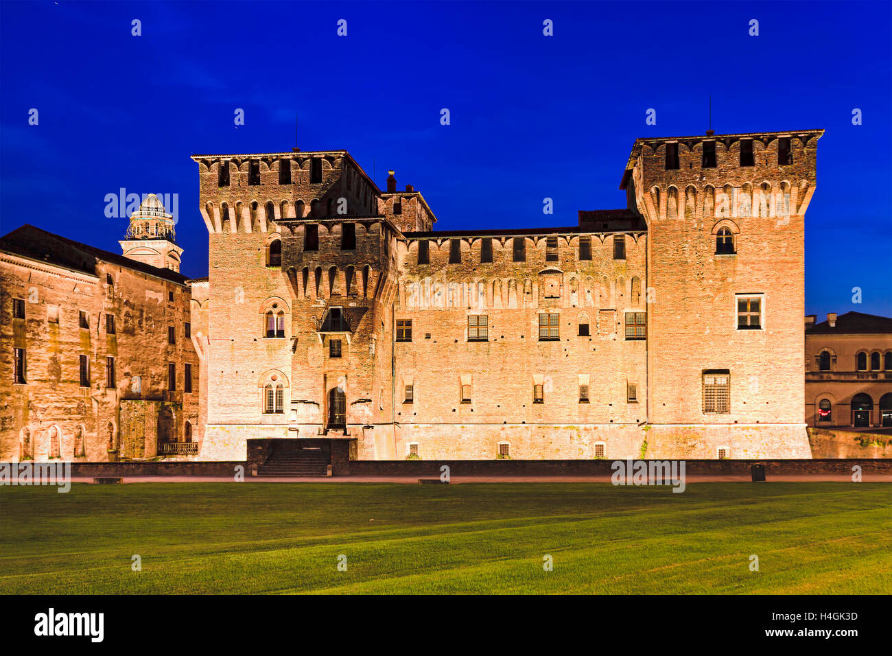 powerful towers of Ducale Palace Saint George castle at sunset in ...