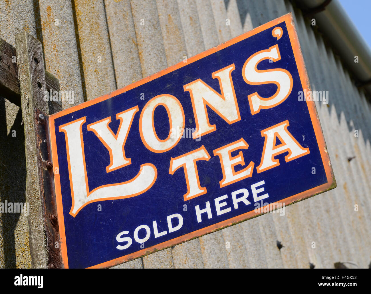 Old metal sign advertising Lyons Tea Stock Photo - Alamy