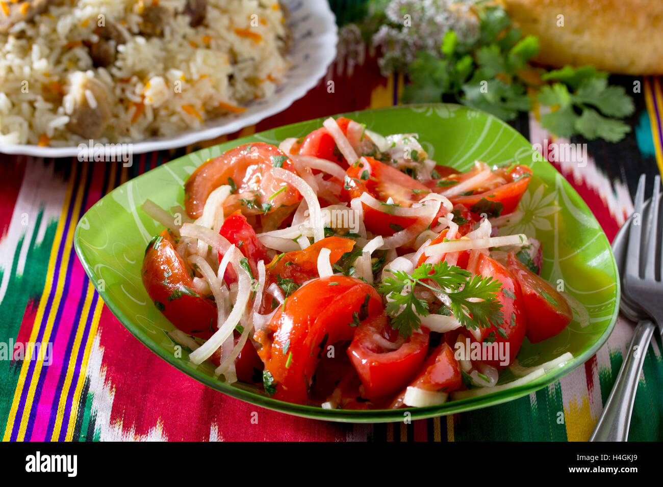 Fresh salad with tomatoes, onions and coriander - Achik-chuchuk. The ...