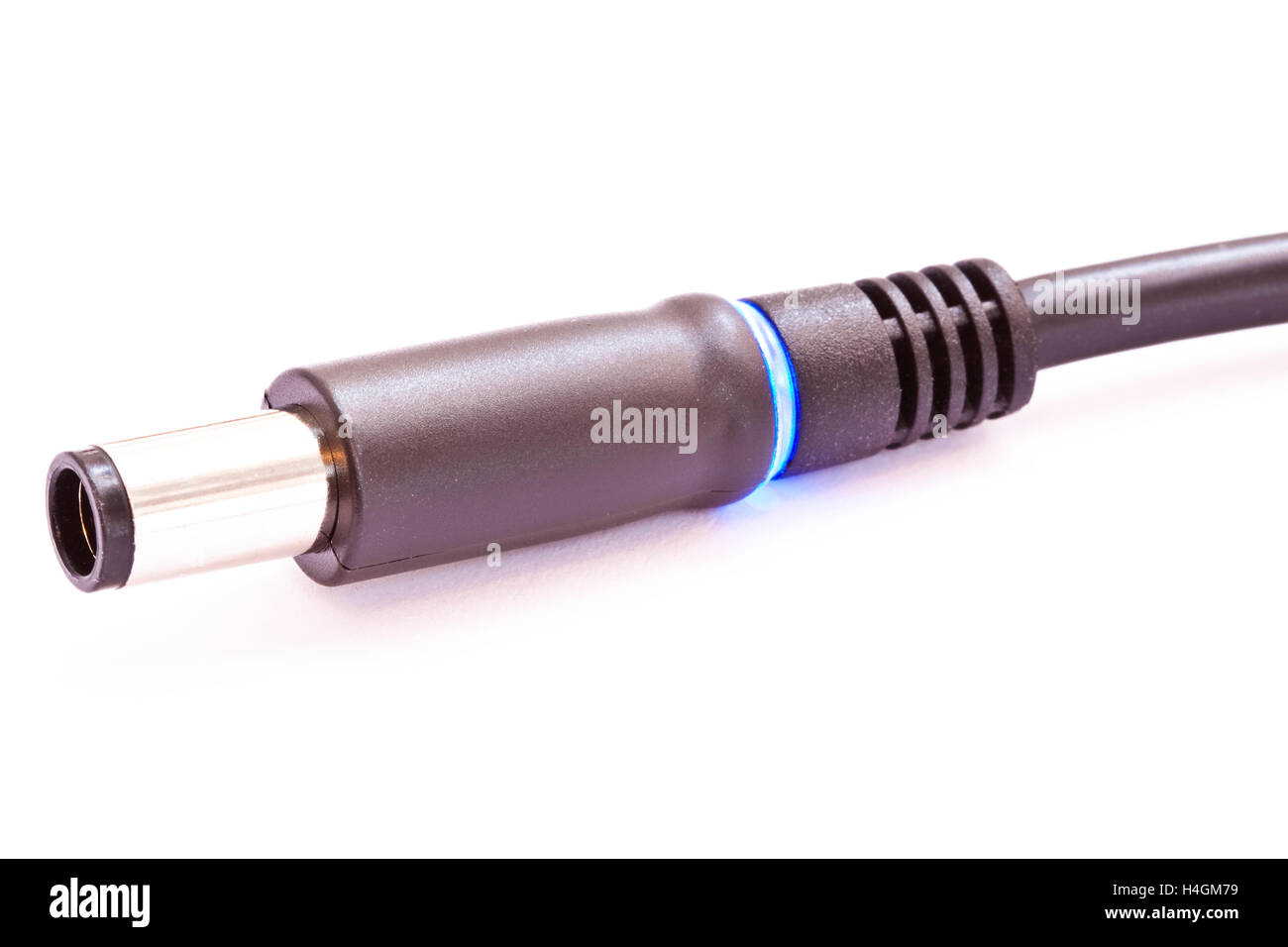Close up of a computer power lead on a white background Stock Photo - Alamy