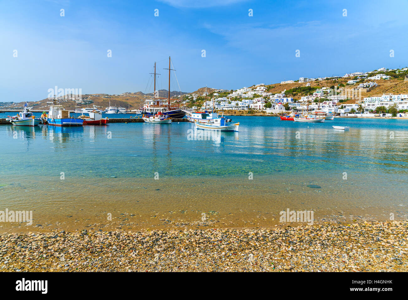 Beach and fishing boats in Mykonos port, Mykonos island, Greece Stock ...