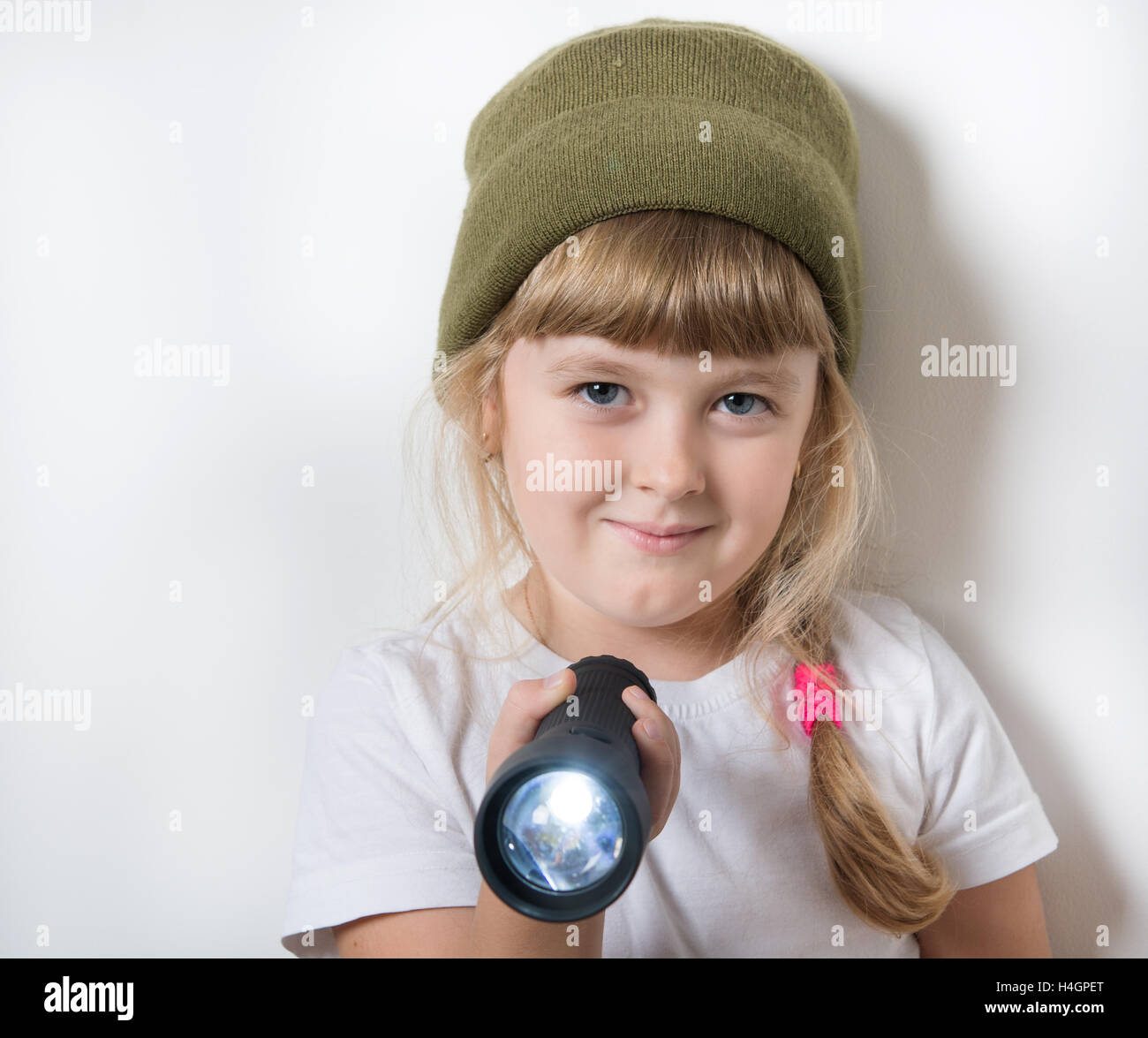 girl playing with a flashlight Stock Photo - Alamy