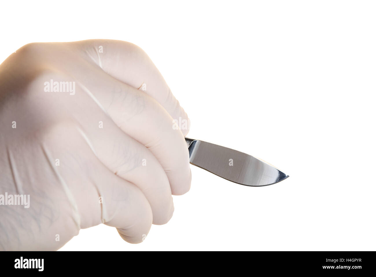Medical scalpel in hand on white background isolated Stock Photo - Alamy
