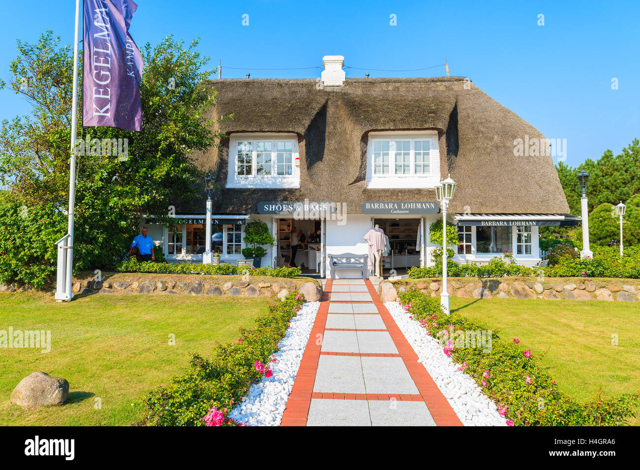 KAMPEN, SYLT ISLAND - SEP 7, 2016: path to luxury shop in Kampen ...