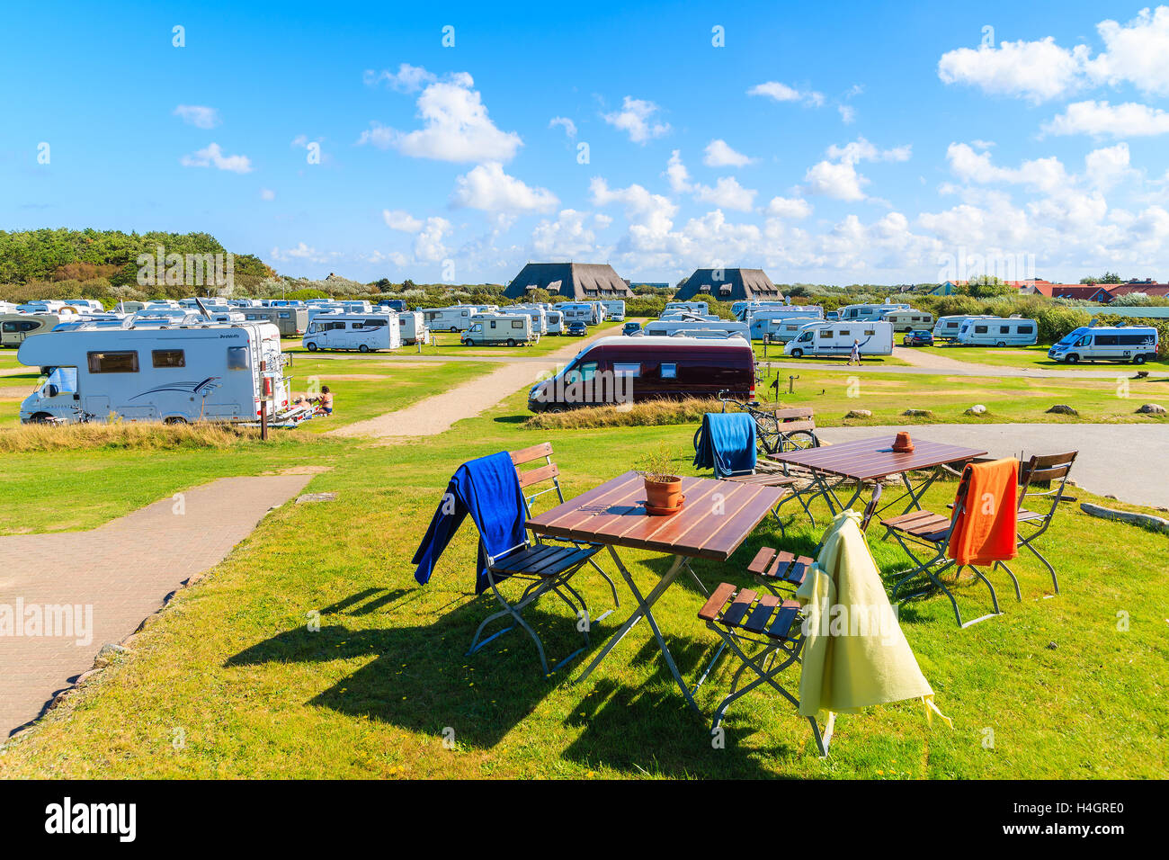 SYLT ISLAND, GERMANY - SEP 9, 2016: restaurant tables on green area of ...