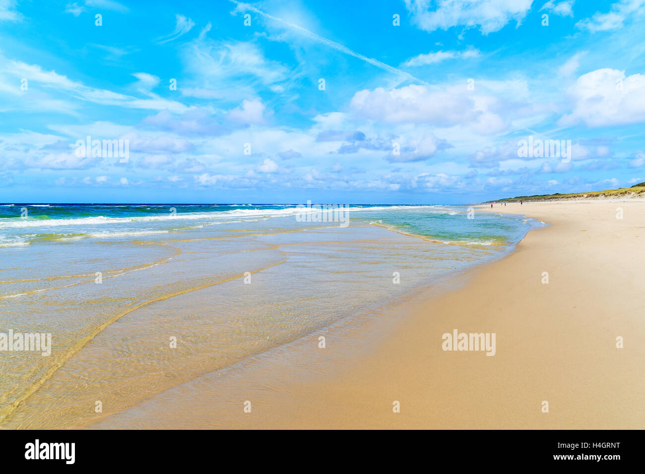 Shallow sea water on beautiful sandy beach at low tide, Sylt island ...