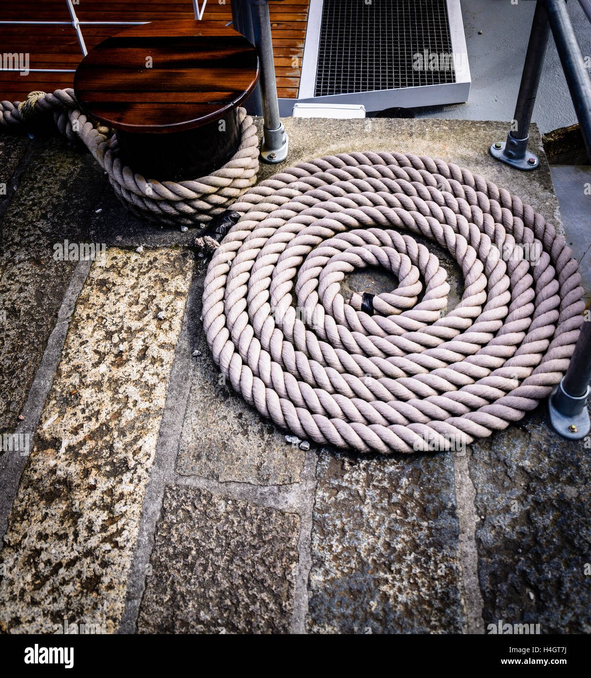 A coiled mooring rope Stock Photo - Alamy