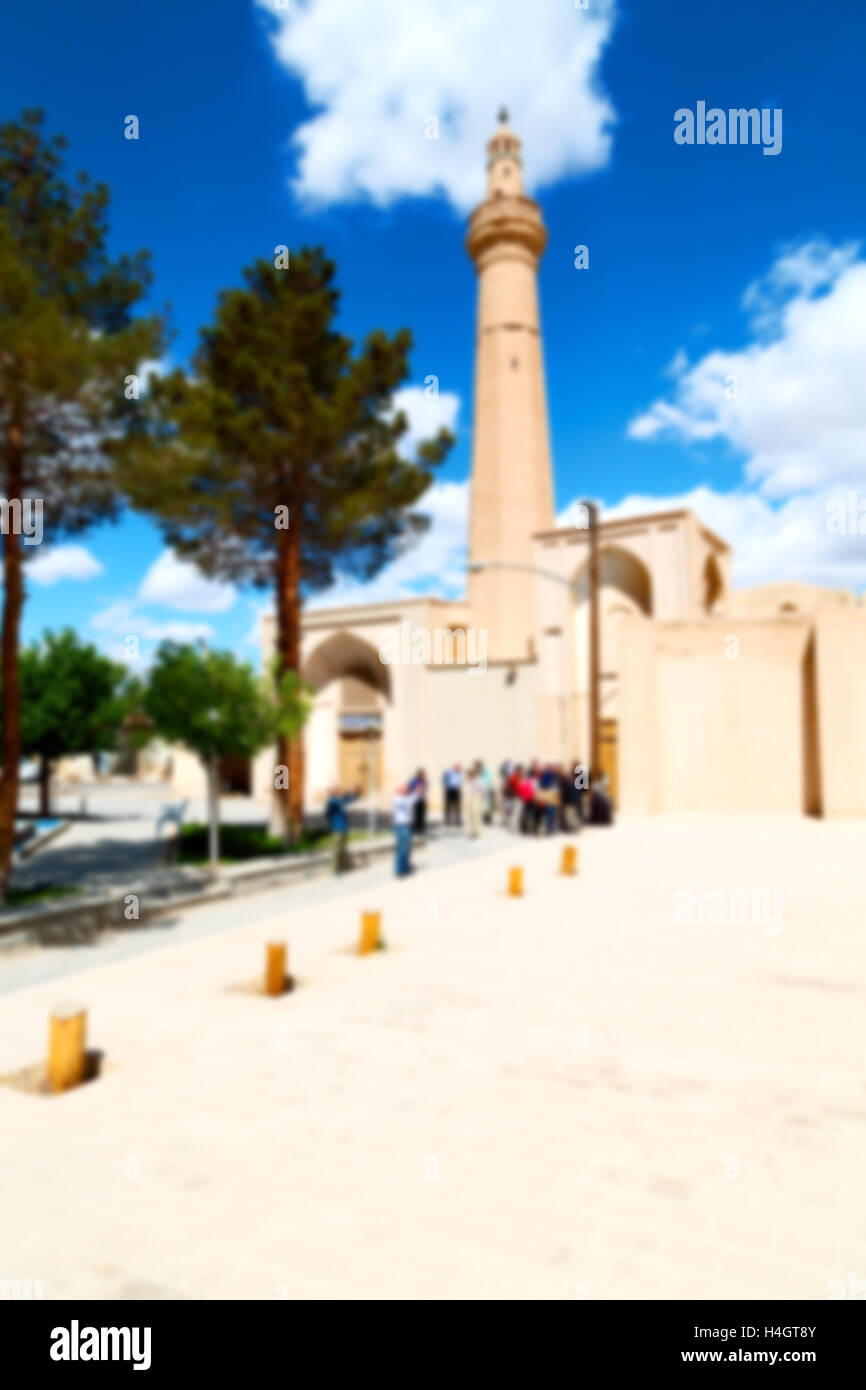 blur in iran blur islamic mausoleum old architecture mosque minaret near the sky Stock Photo - Alamy