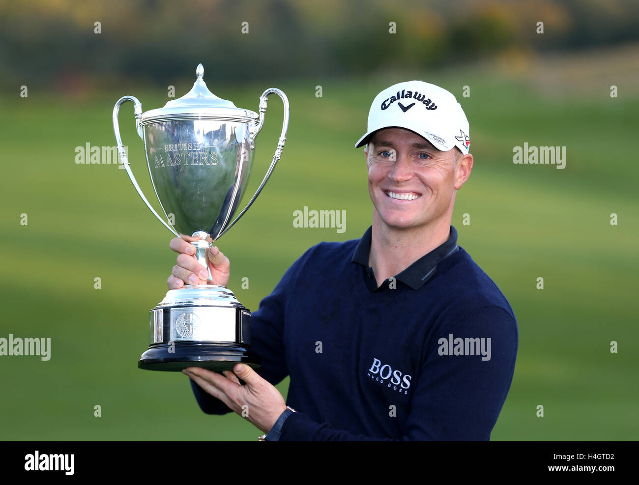 Sweden's Alex Noren celebrates with the trophy after his victory during ...
