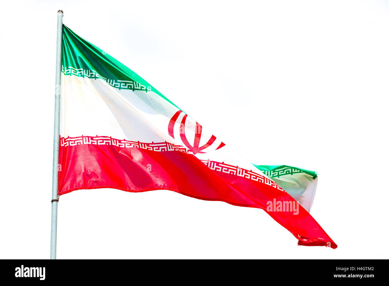 in iran blur iranian waving flag the blue sky and wind Stock Photo - Alamy