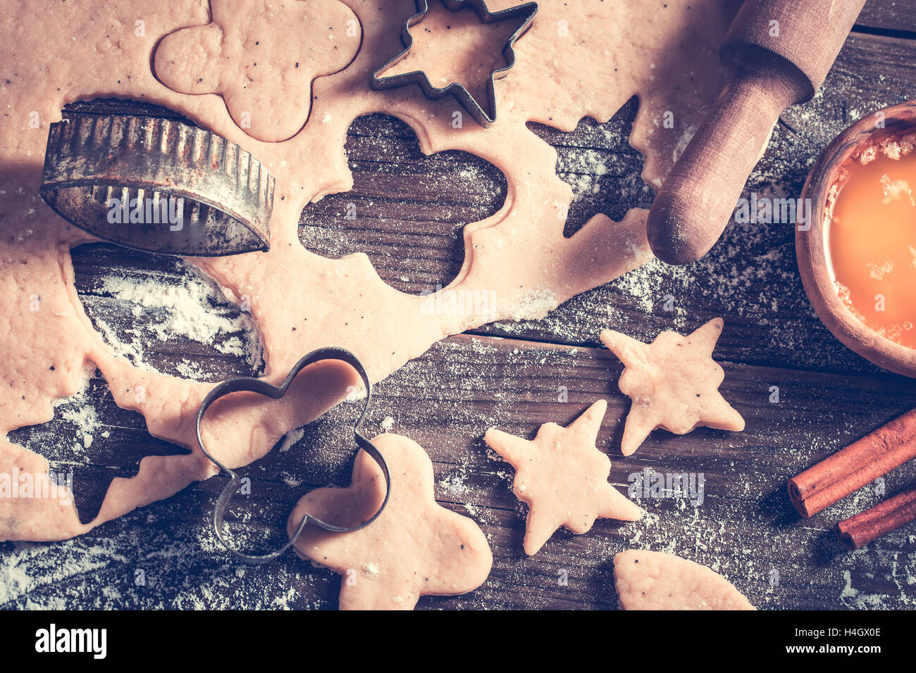 Various shapes cookie cutters and dough Stock Photo - Alamy