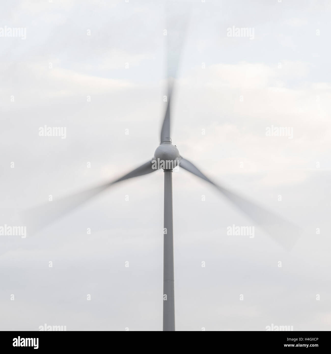 Wind turbine blades turning with blurred motion Stock Photo - Alamy