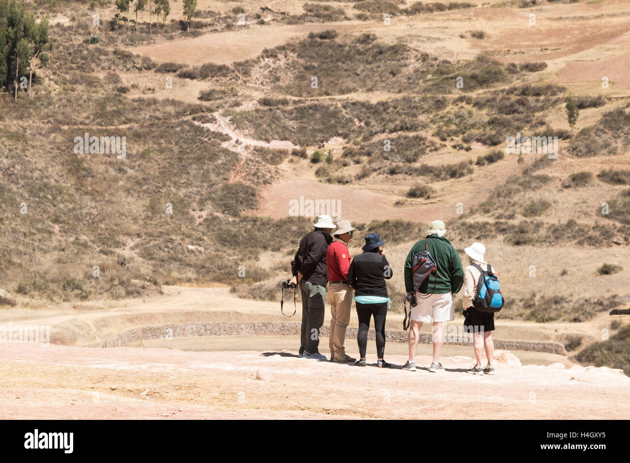 Tourists on a tour at the largest concentric stone farming terrace ...